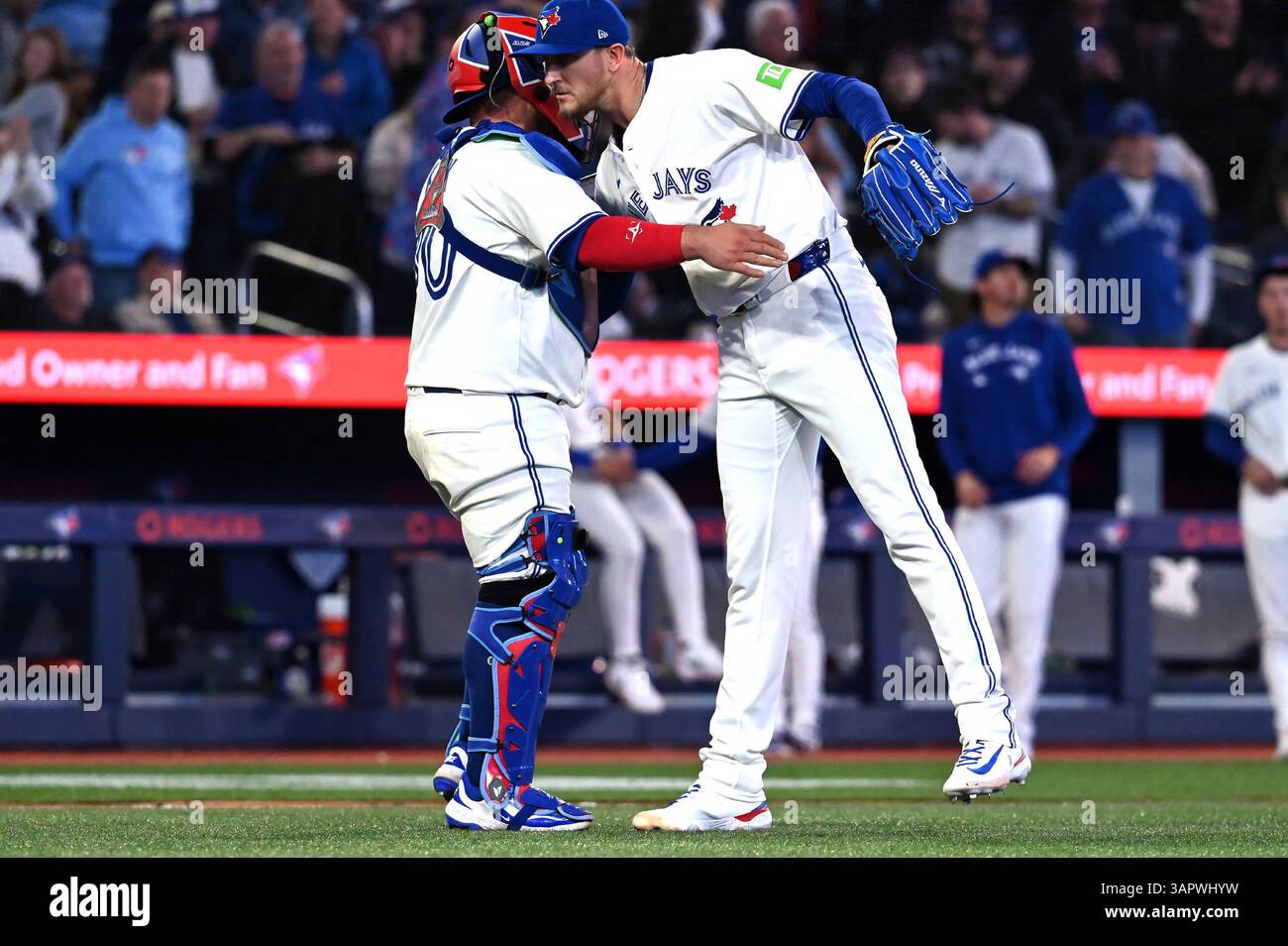 Toronto Blue Jays catcher Alejandro Kirk, left, and relief pitcher Jeff ...