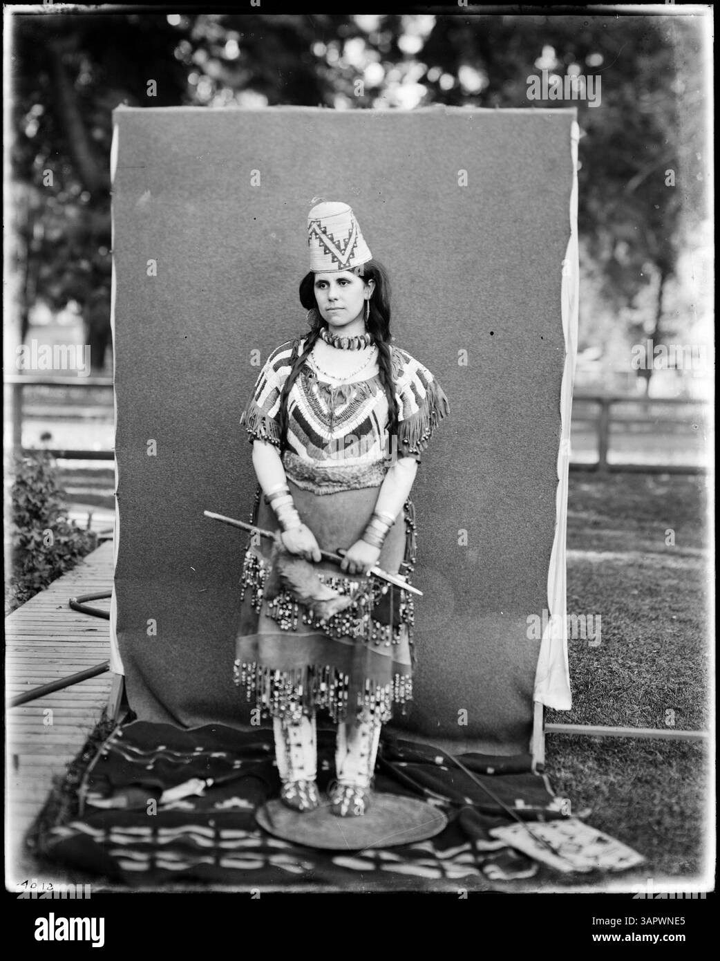 Photograph by Lee Moorhouse of Ida Coyote, a young Cayuse girl, wearing ...