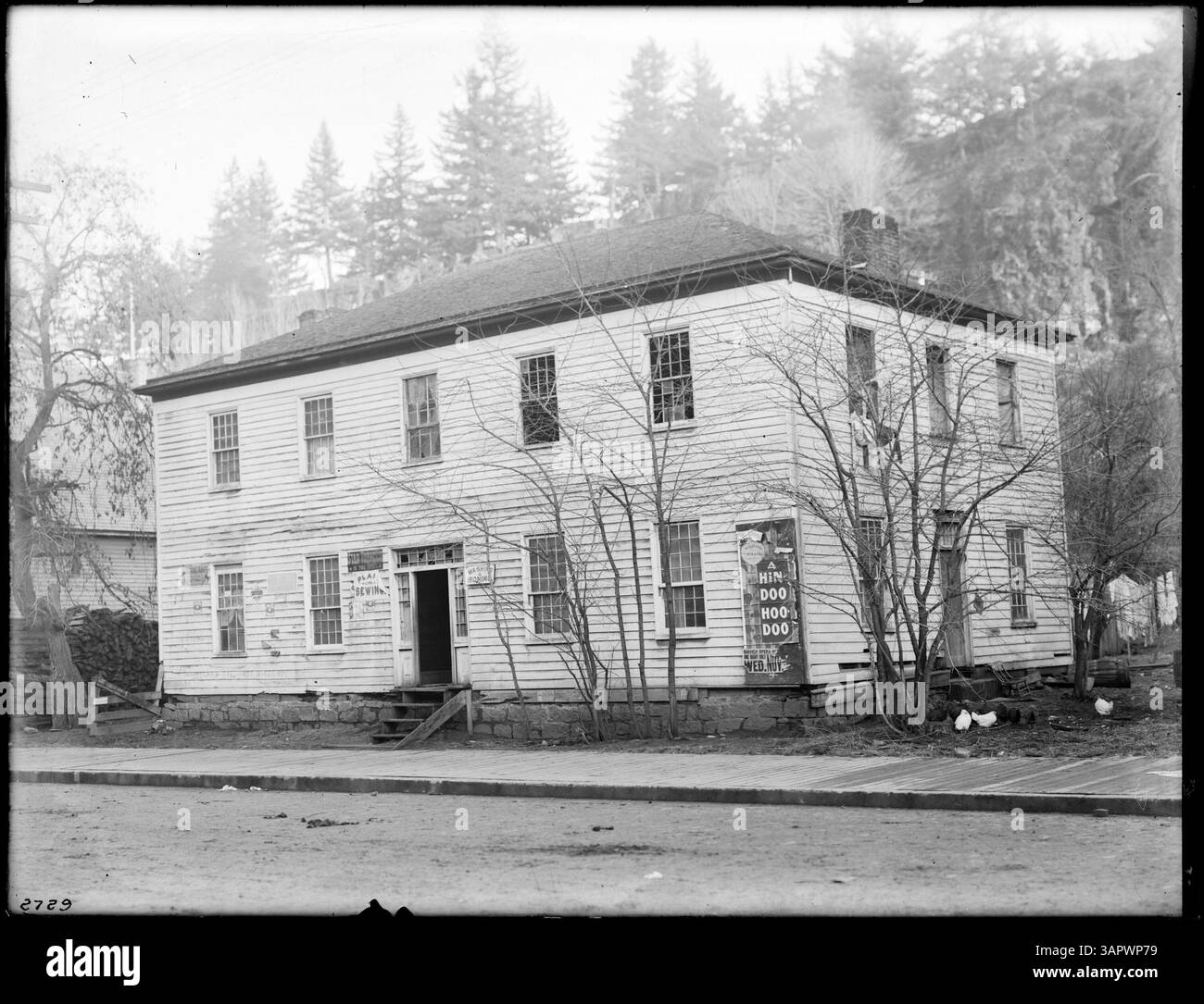 This photograph shows the exterior of the John McLoughlin house in ...