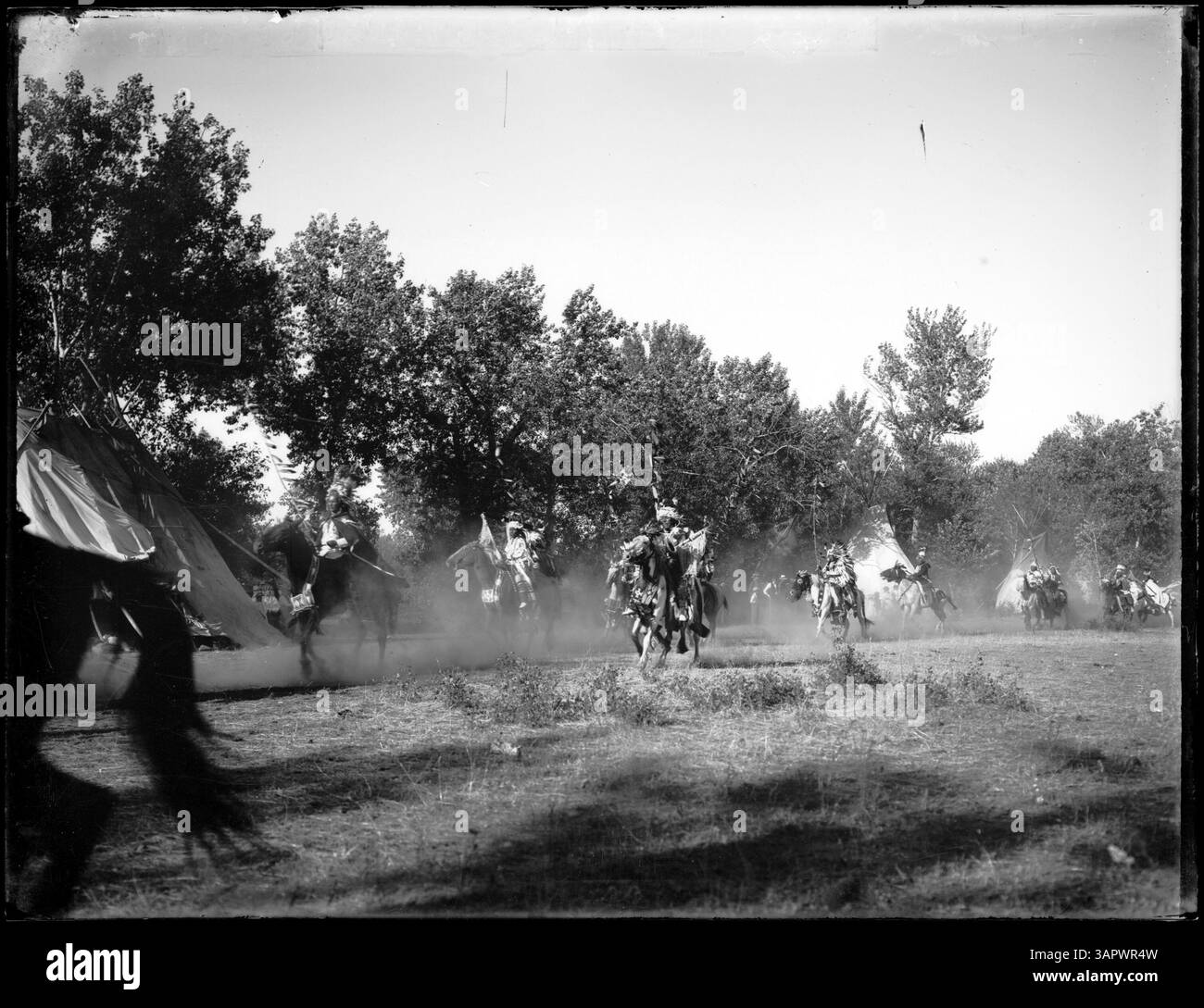 This photograph captures a group of Native American men from the ...