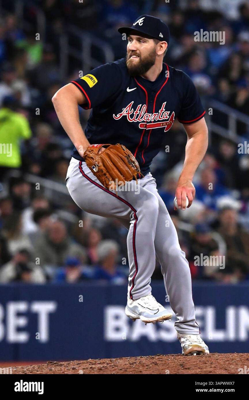 Atlanta Braves relief pitcher Dylan Lee (52) throws to a Toronto Blue ...
