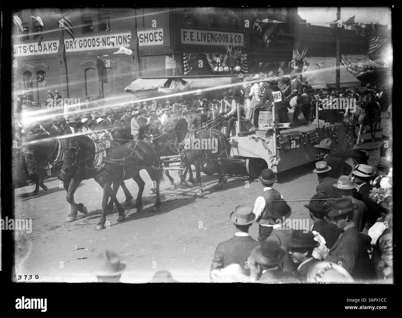 Photograph of a float titled 'Cowboy Ball' in a roundup parade. The ...