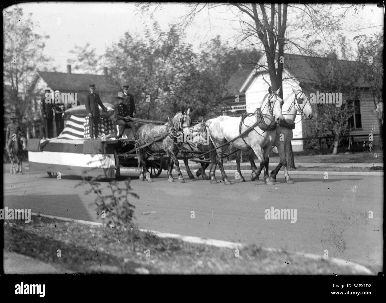 A U.S. Navy float with a torpedo on display, located on a residential ...
