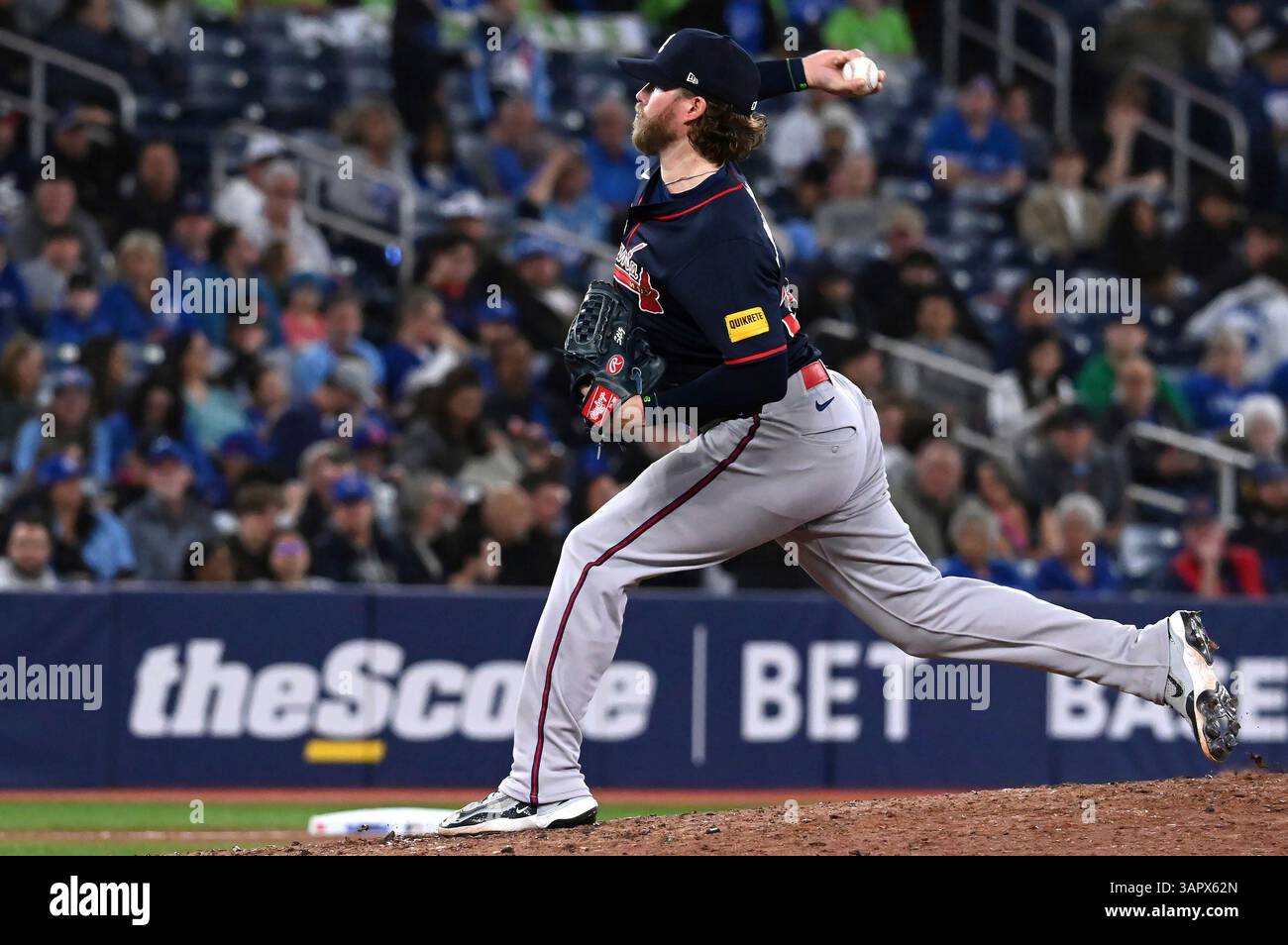 Atlanta Braves relief pitcher Pierce Johnson (38) throws to a Toronto ...