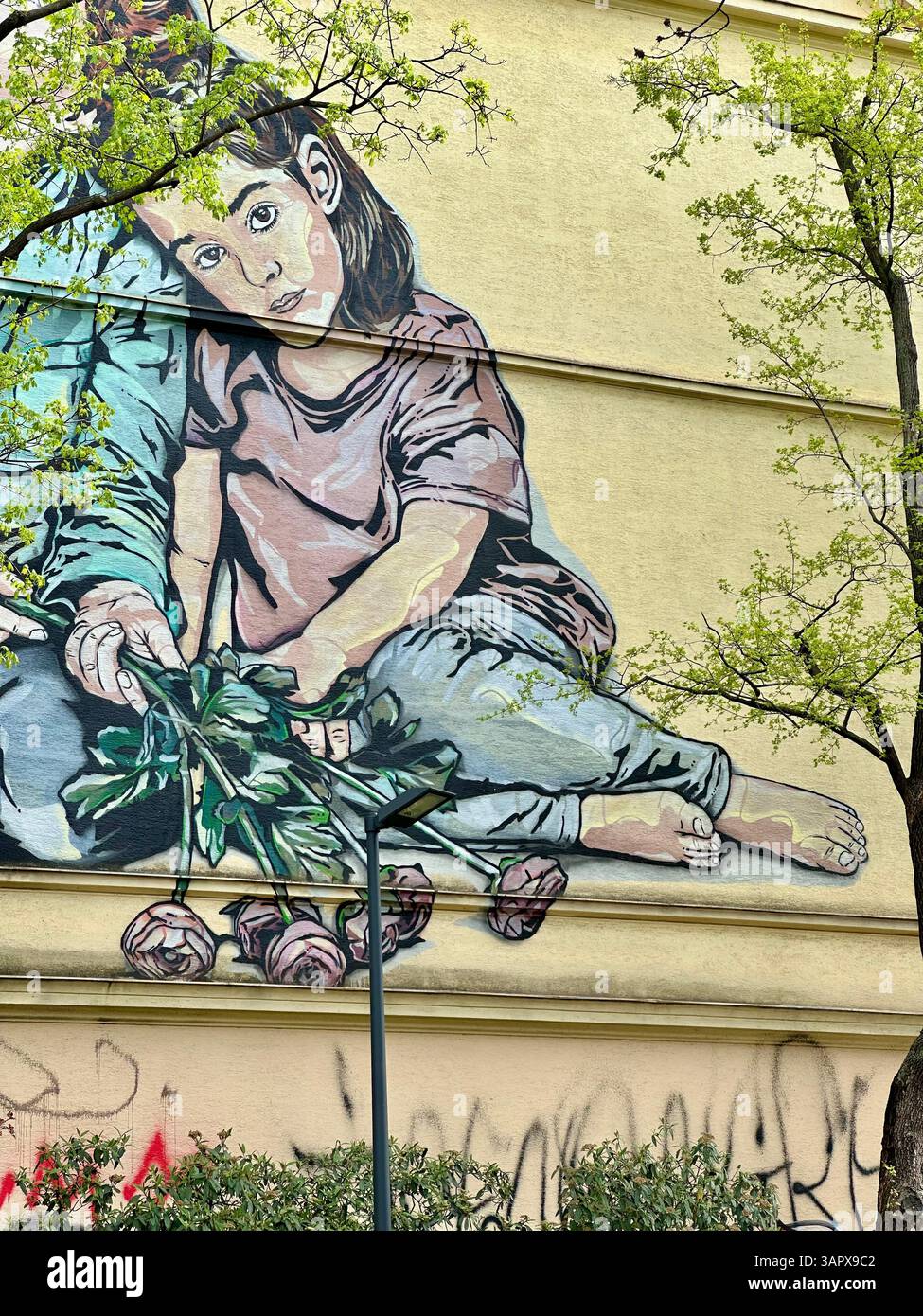 Mural street art of a boy and a girl by jana & js in Währinger Straße ...