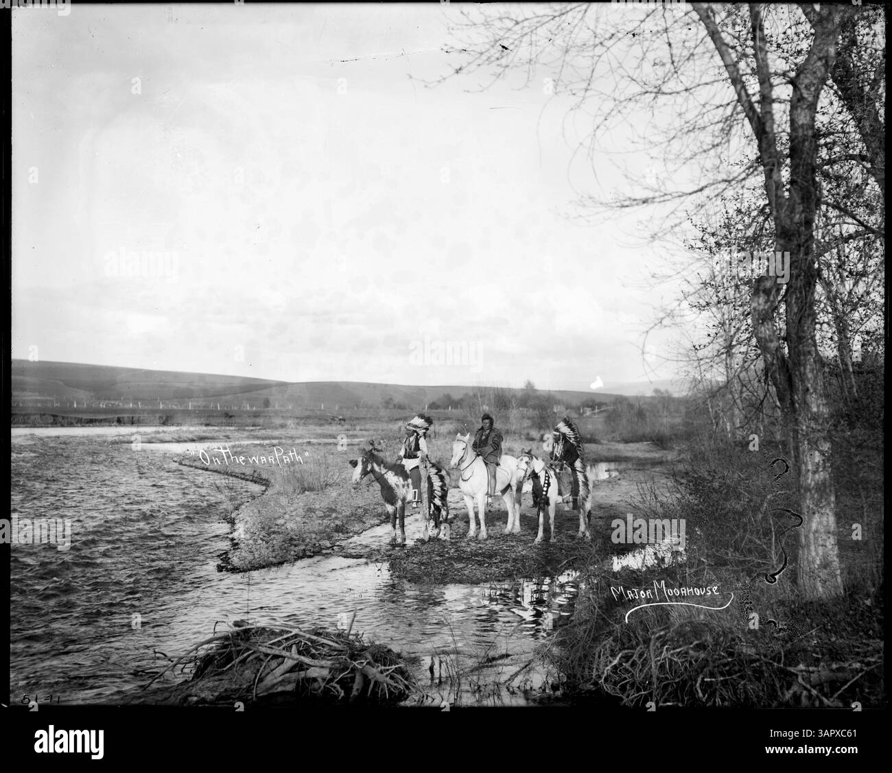 Photograph of Cayuse Indians in traditional 'war dress' on horseback ...