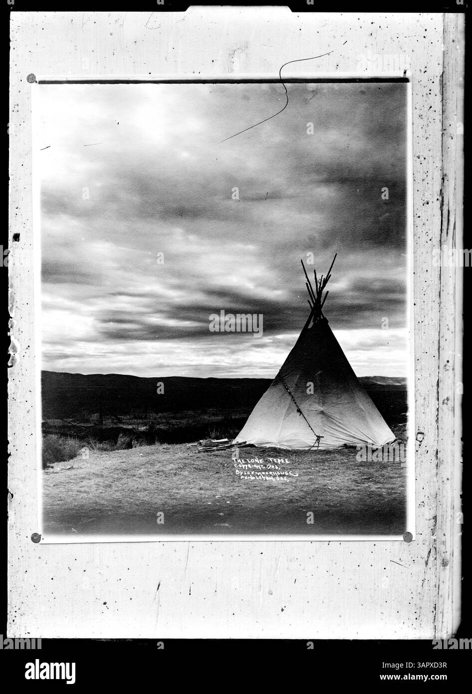 The photograph titled 'The Lone Tipi' shows a solitary tipi standing ...