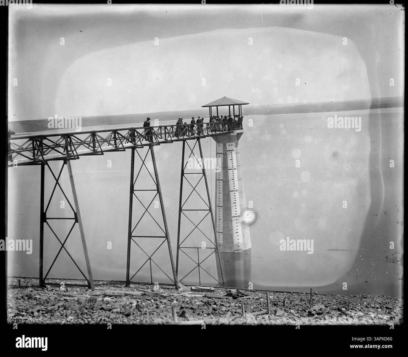 This photograph features a water gauge and intake at the Furnish ...
