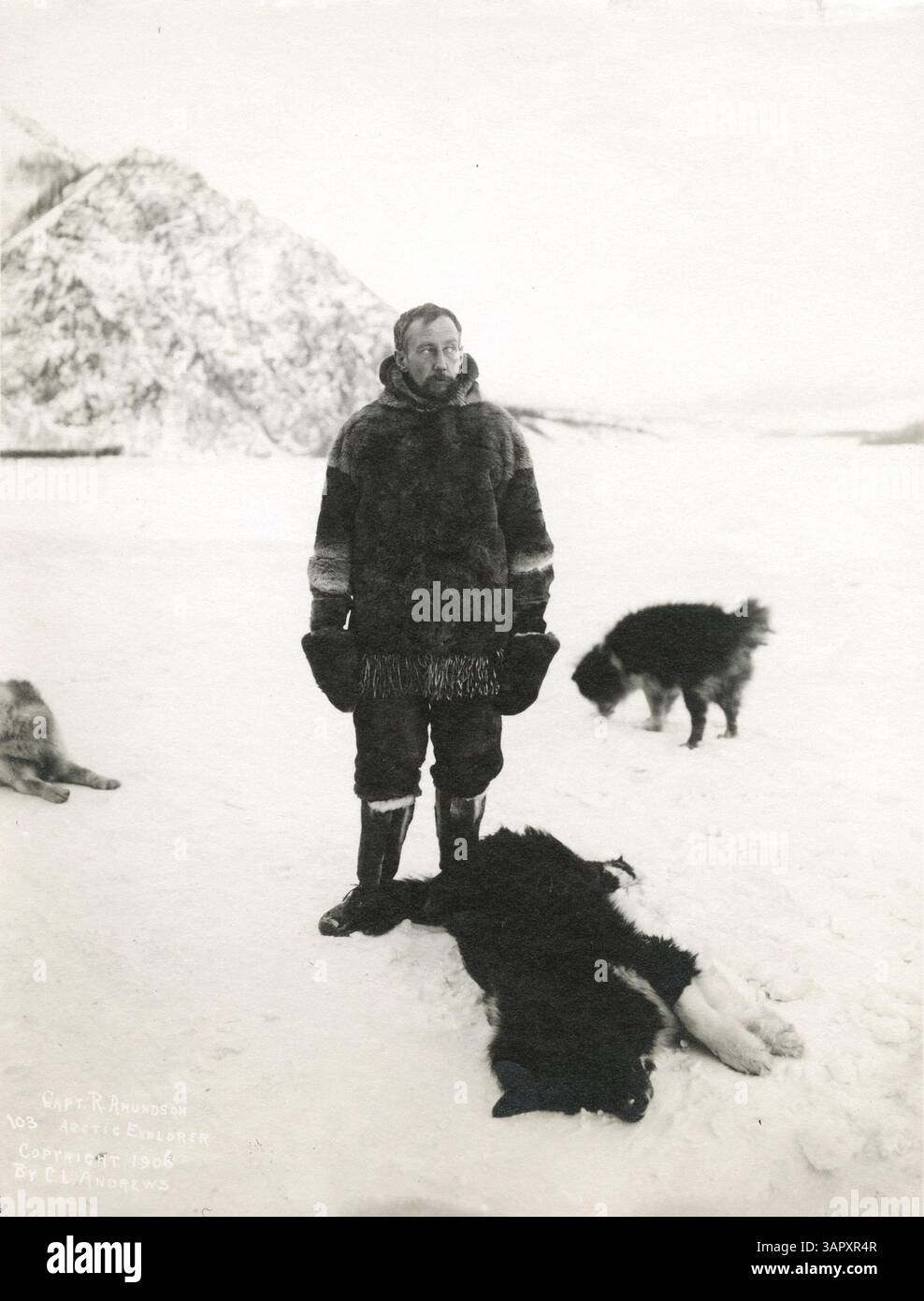This photograph shows a man identified as R. Amundsen standing in a ...