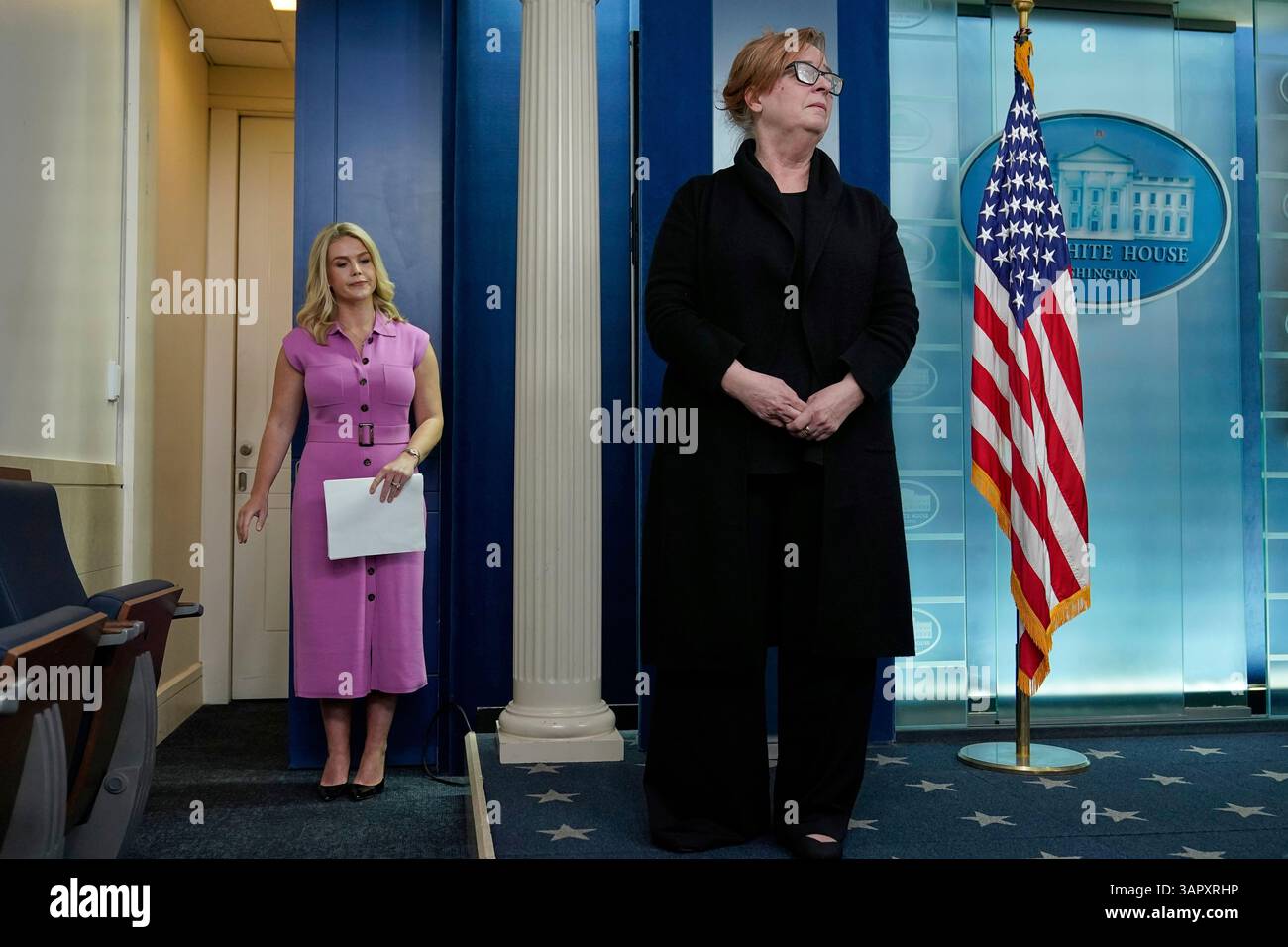 White House press secretary Karoline Leavitt listens as Patty Morin ...