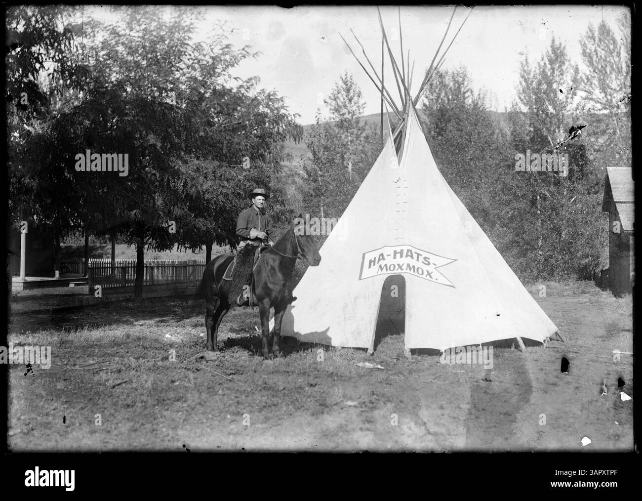 Lee Moorhouse’s photograph captures a cowboy, a horse, and a tipi ...