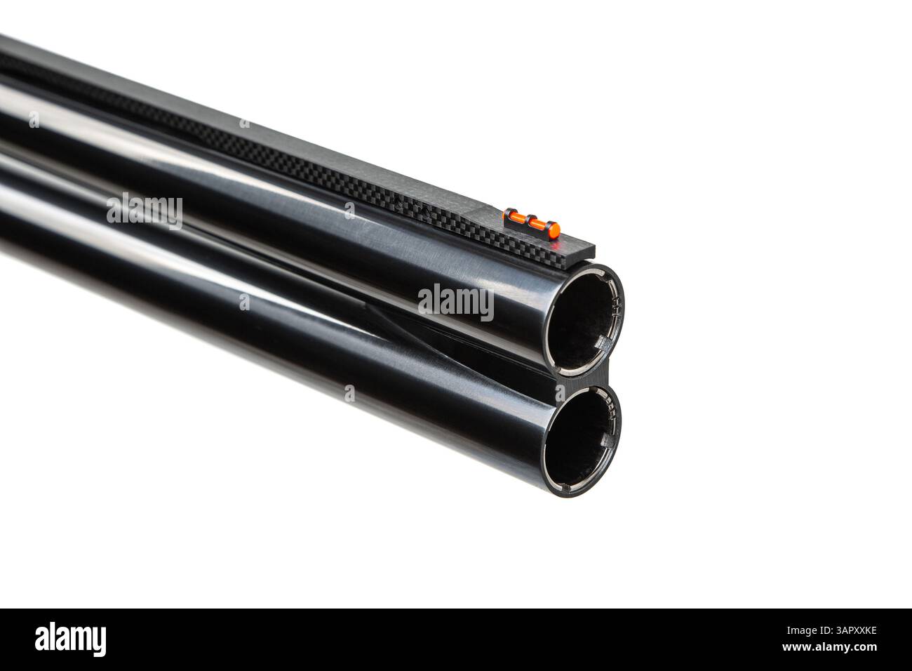 Close-up view of double-barrel shotgun muzzle with fiber optic front ...