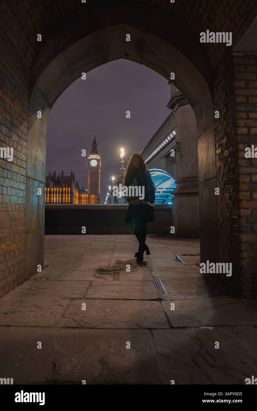 Nighttime View of Big Ben Framed by Arched Brick Passageway Stock Photo ...