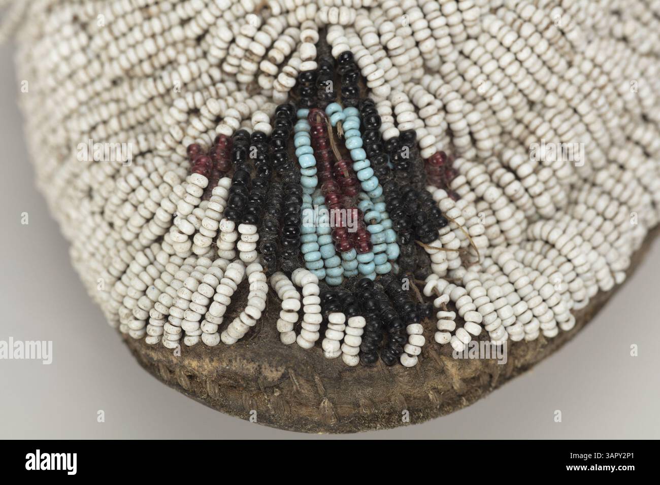 The Cheyenne Beaded Moccasins feature colorful bead patterns that are ...