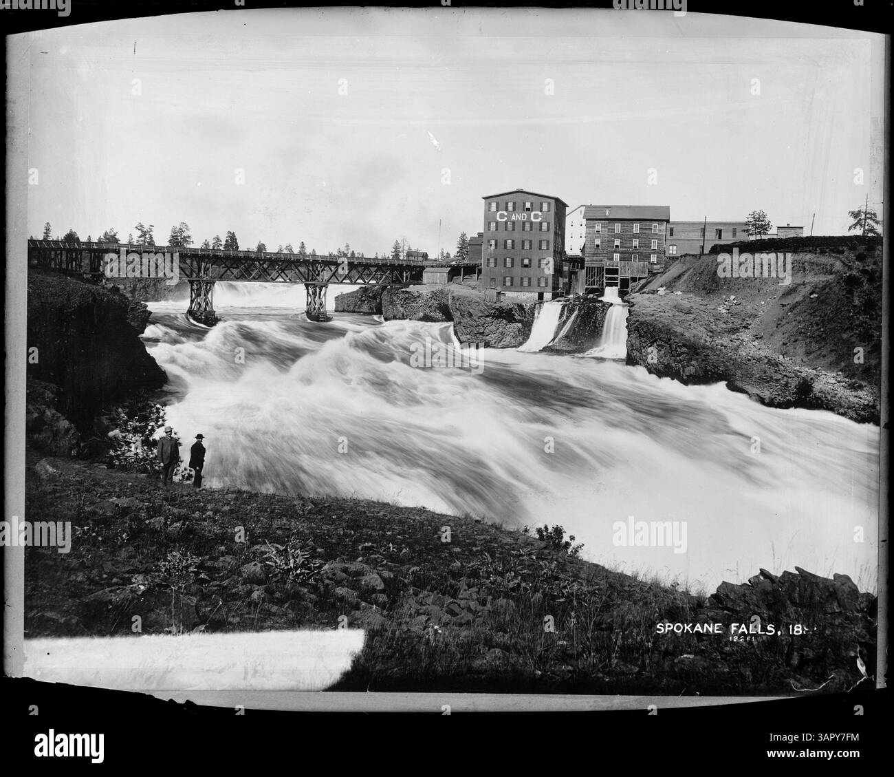 This photograph captures the C and C Power Plant at Spokane Falls ...