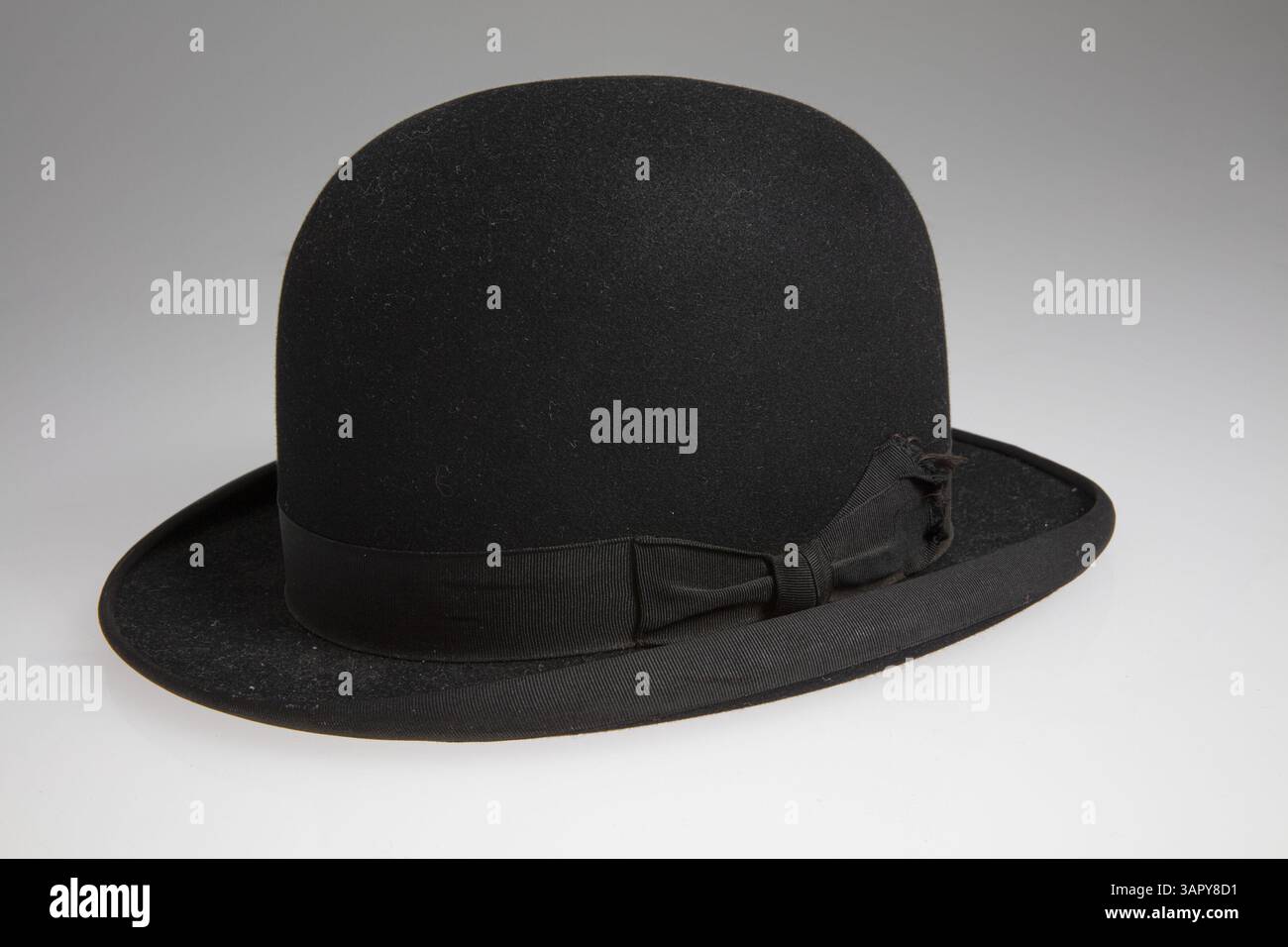 A black felt derby hat made by the John B. Stetson Hat Company ...