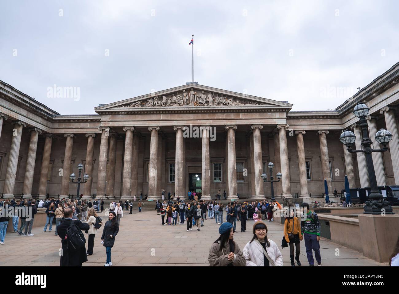 The British Museum Facade with Ionic Columns and Union Jack Flag Stock ...