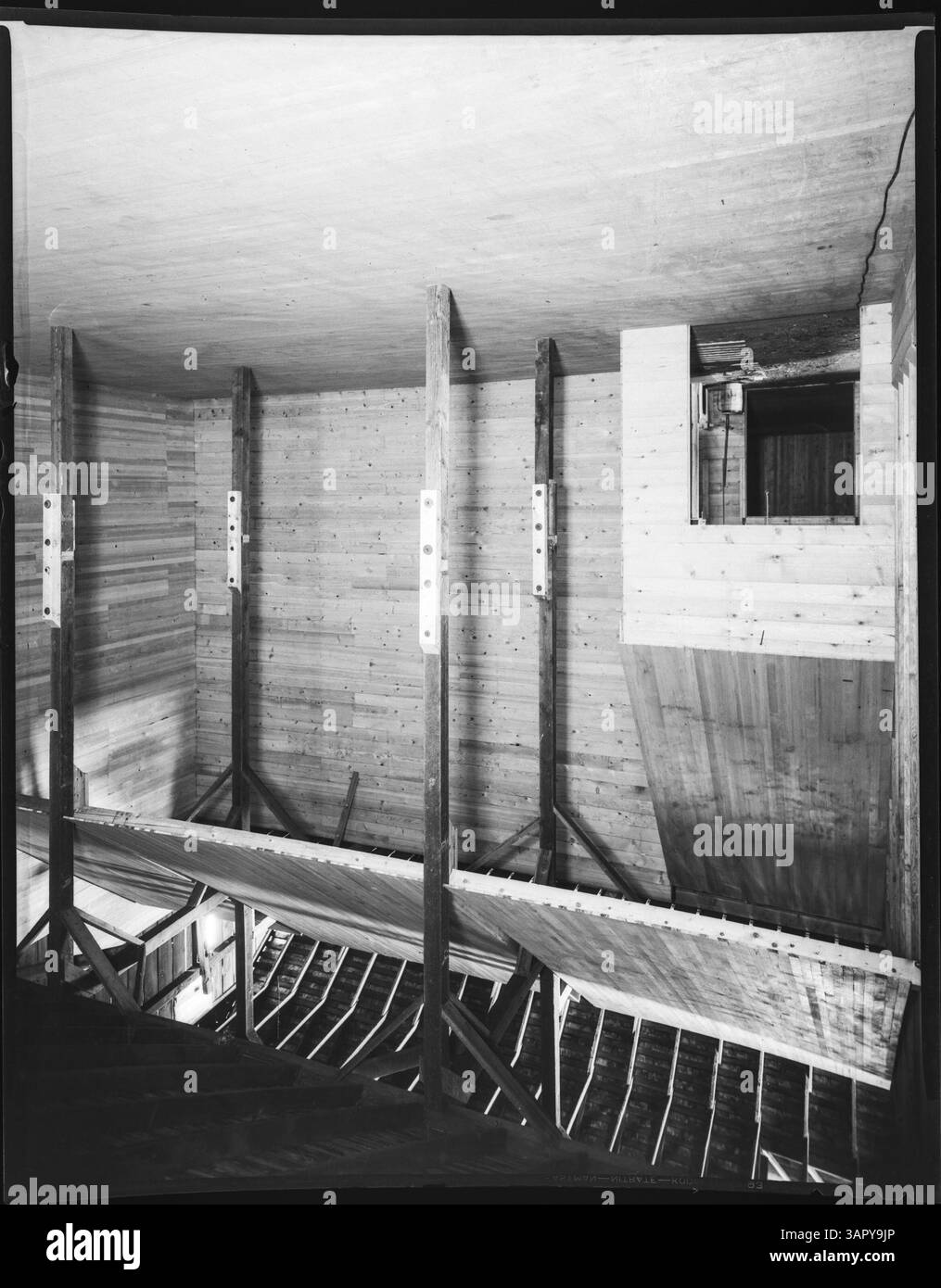 Photograph of the interior of a factory, showing machinery and the ...