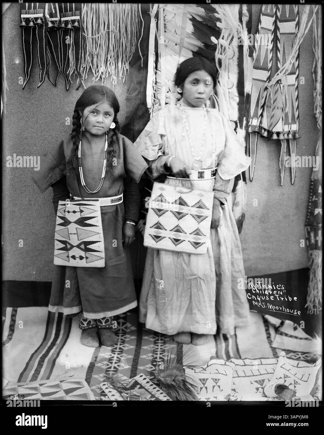 A photograph of children from the Motanic, Cayuse Indian tribe, dressed ...