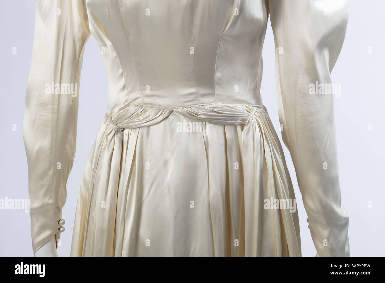 The ivory rayon satin wedding dress and tulle veil worn by Mildred ...