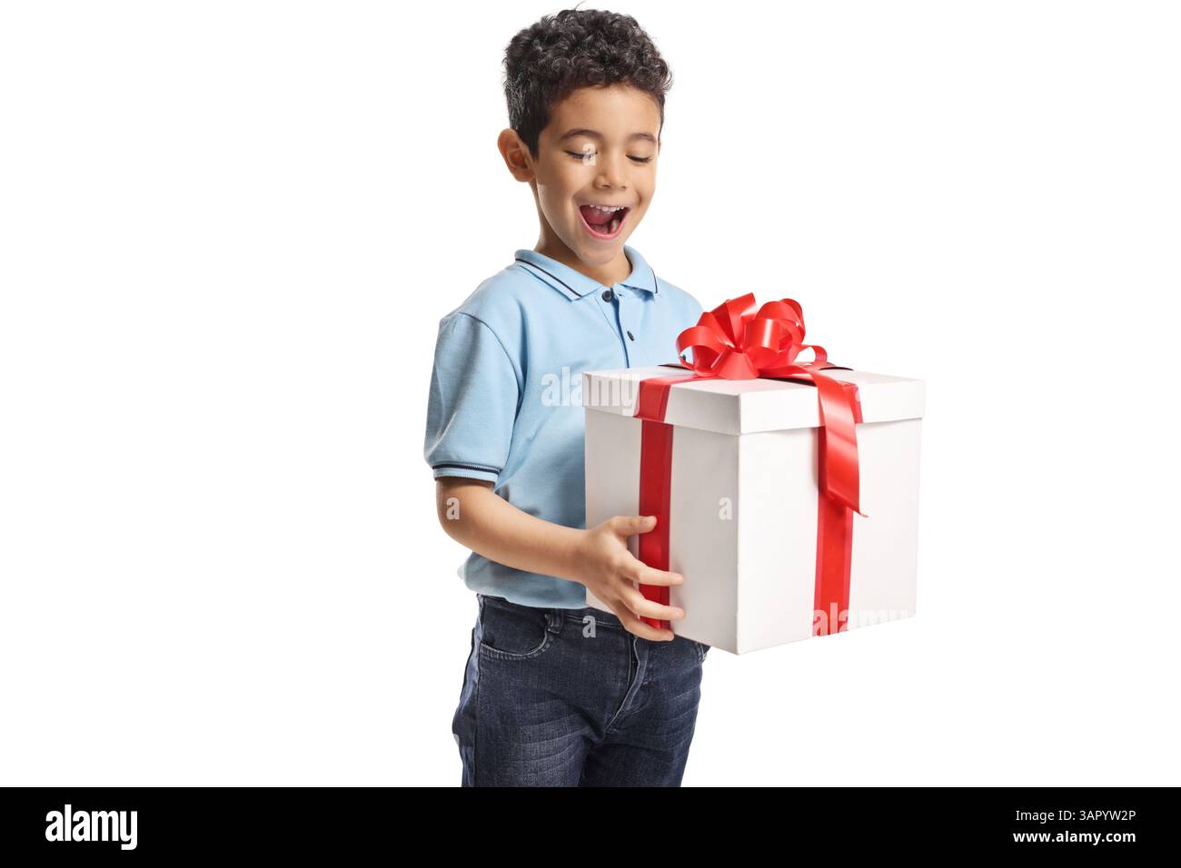 Excited boy holding a big gift box isolated on white background Stock ...