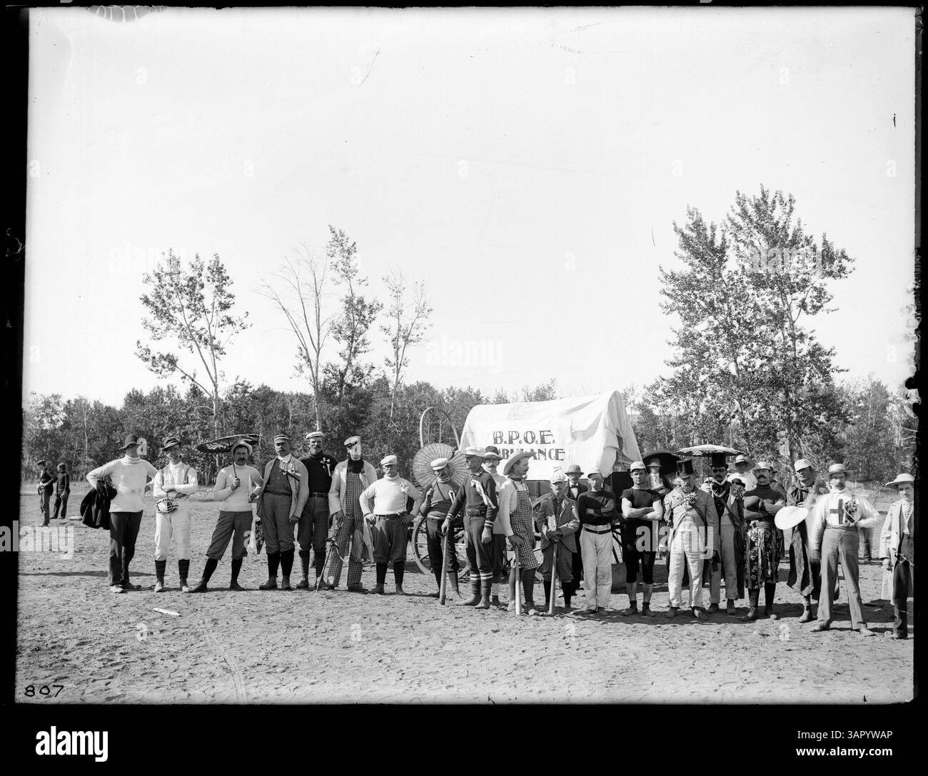 Photograph of a group of men in various costumes posed near the BPOE's ...