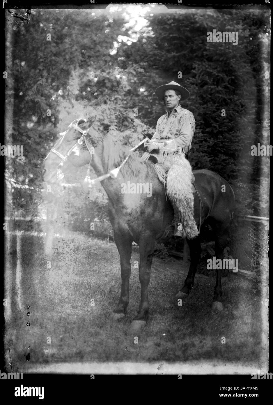 Lee Moorhouse’s photograph features a cowboy in chaps and buckskin on ...