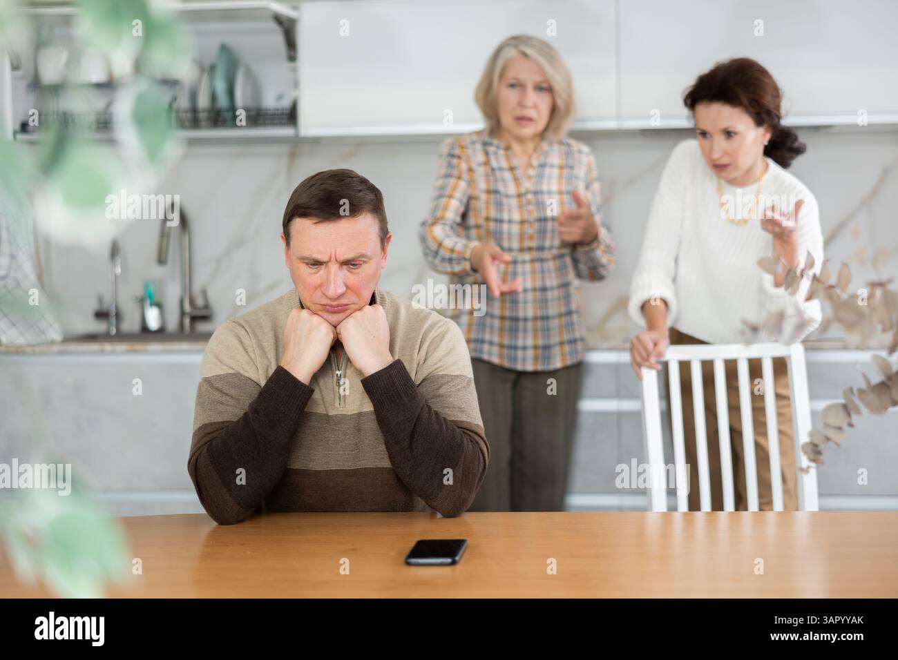 Family quarrel of three people Stock Photo - Alamy