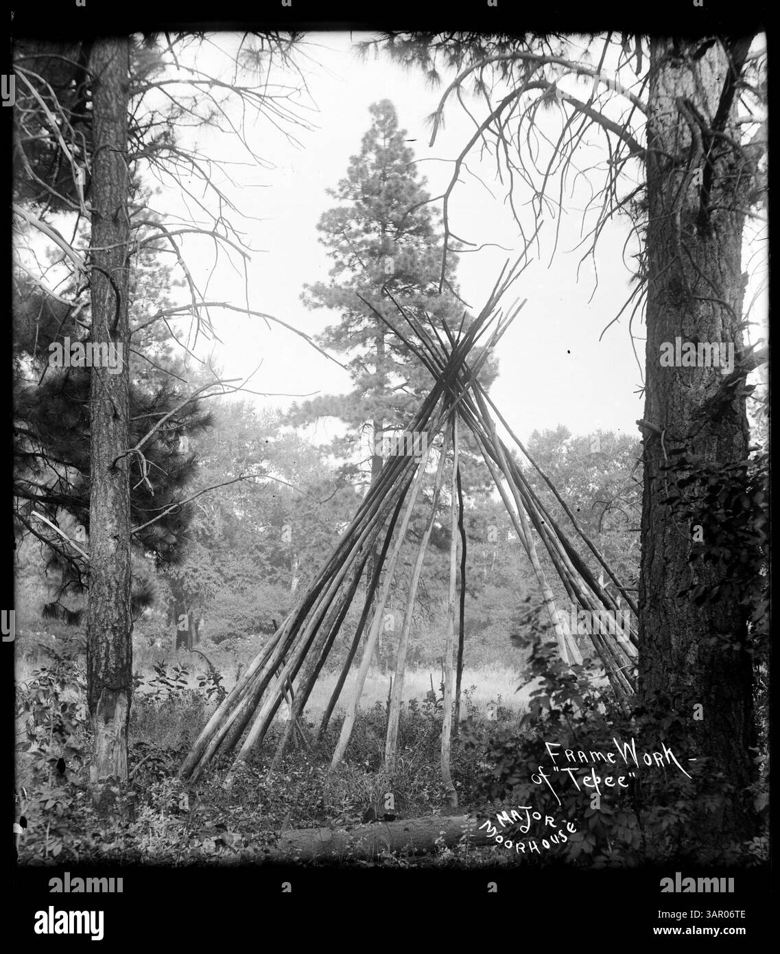 This photograph by Lee Moorhouse captures the framework of a tipi, a ...