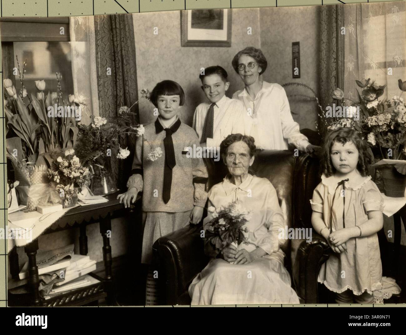 Sarah Woolford celebrates her 100th birthday with her family, including ...