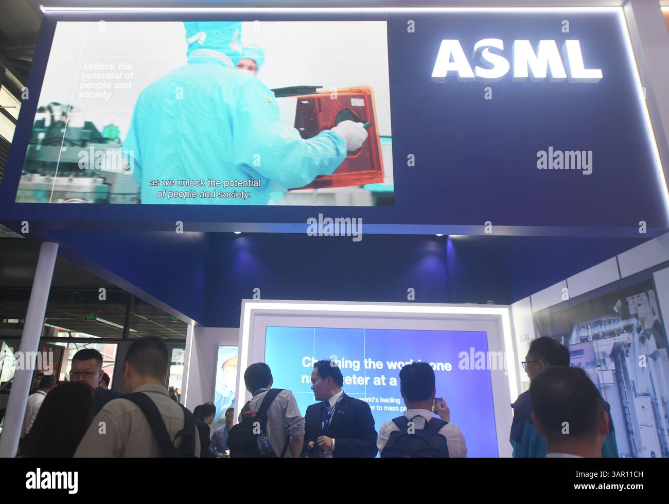 SHANGHAI, CHINA - MARCH 26, 2025 - Visitors visit the stand of ASML at ...