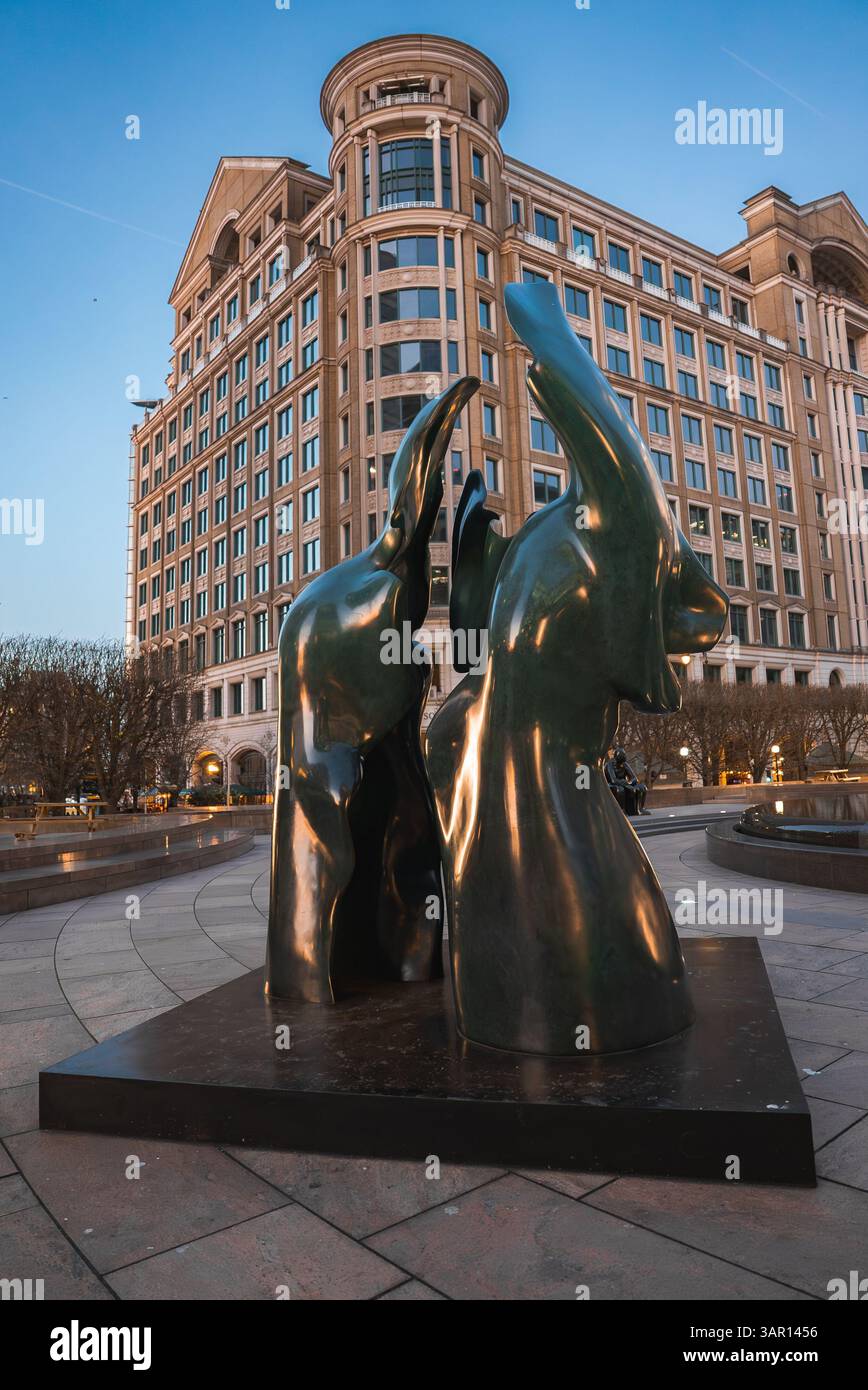 Modern Bronze Sculpture in London Plaza with Classic Building Backdrop ...