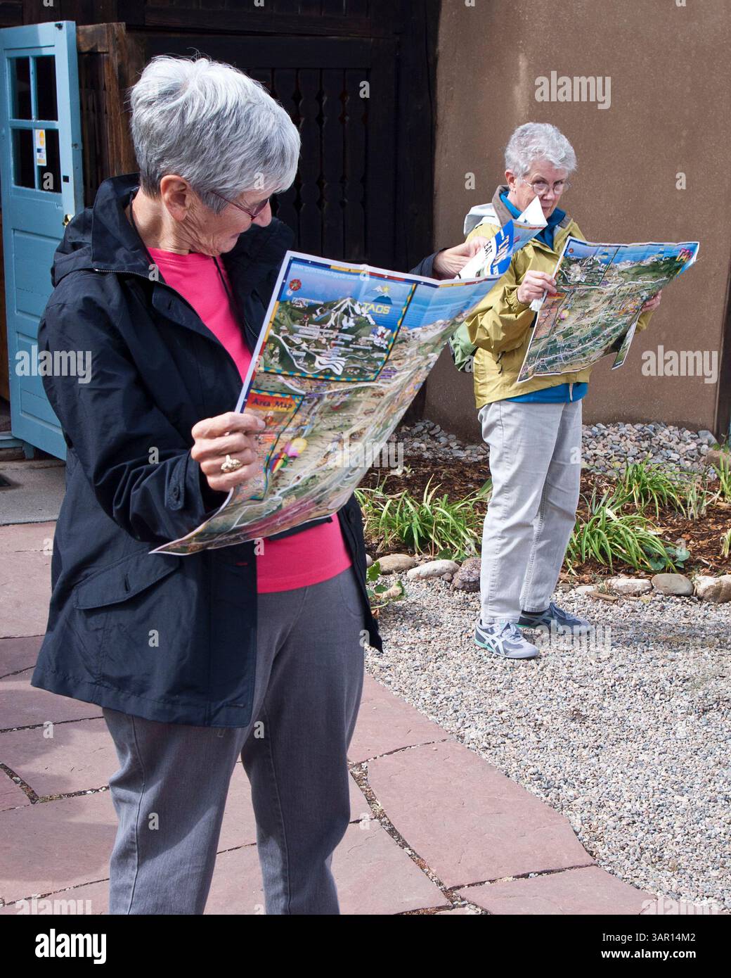 Oct 21, 2010 - Taos, New Mexico, U.S. - Tourists check their local maps ...