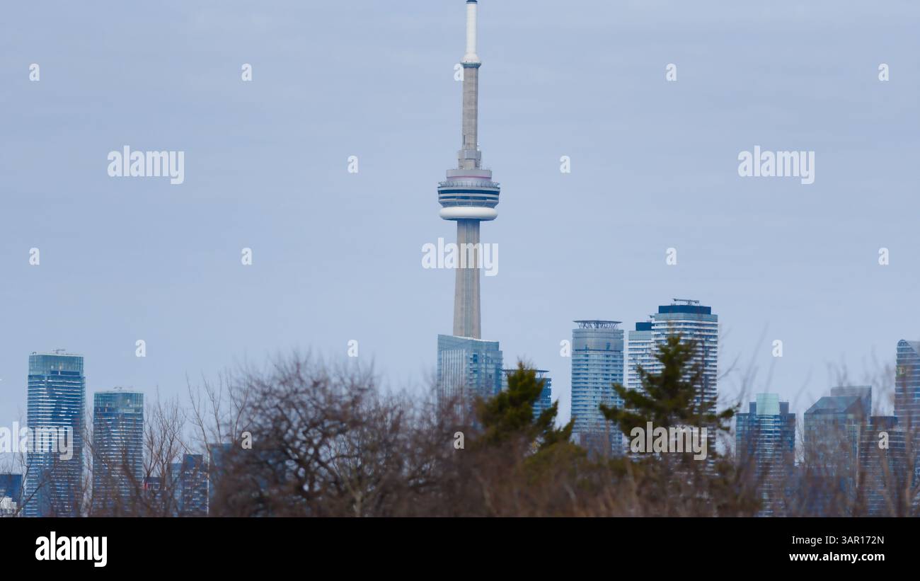A view of the iconic CN Tower rising above Toronto's skyline, seen from Tommy Thompson Park. The ...