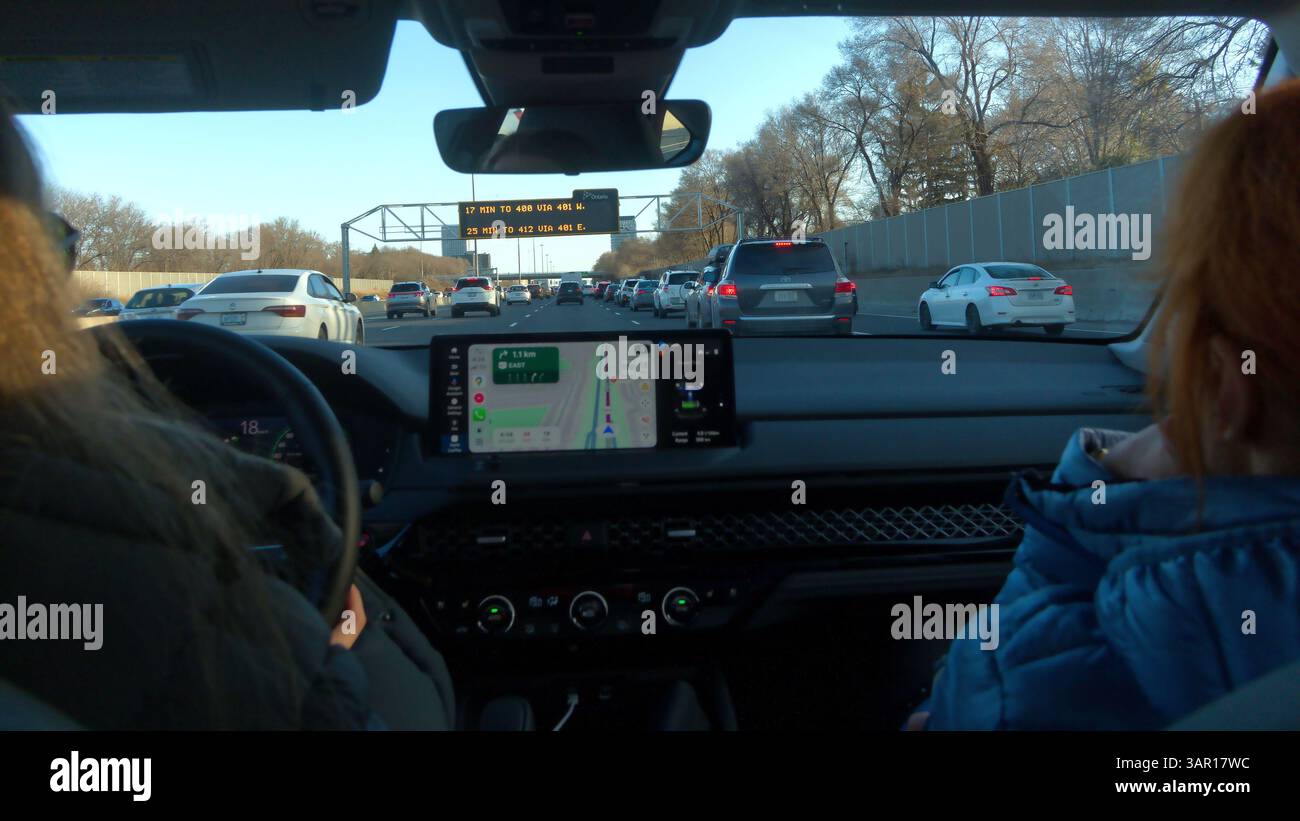 View from inside a car stuck in heavy traffic on an Ontario highway ...