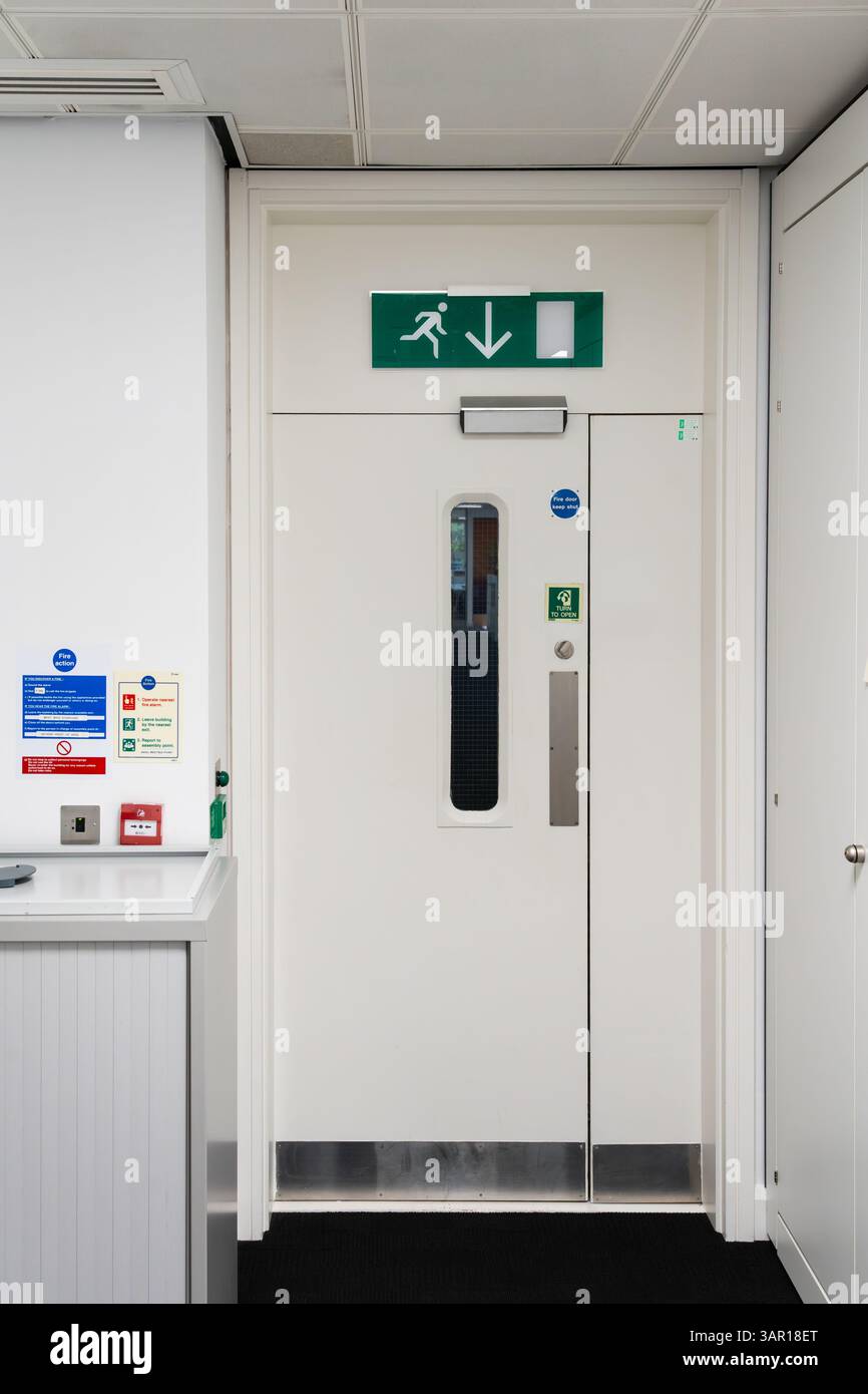 Door leading to office fire escape - an FD60 fire door in an office ...