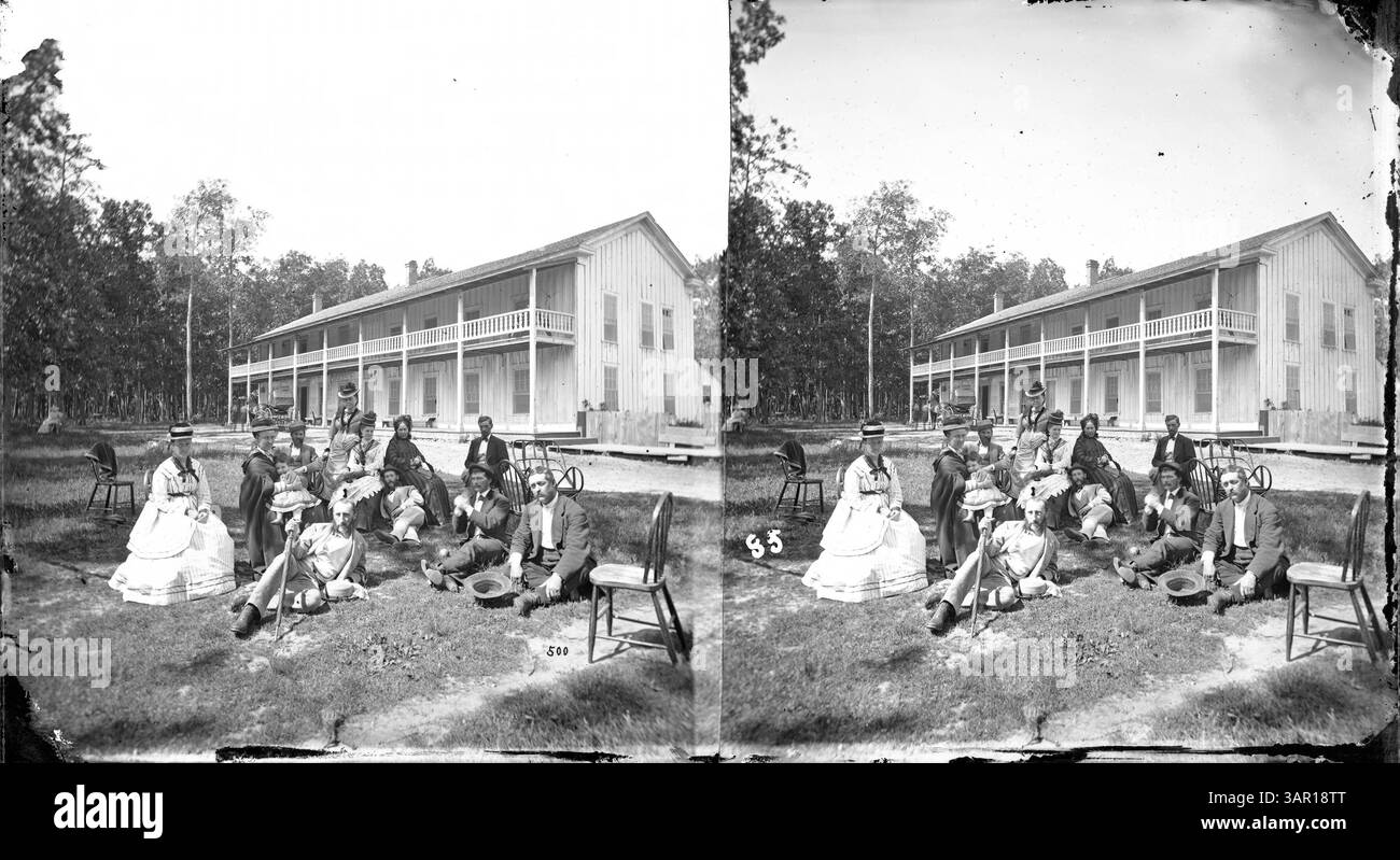 This photo shows about 12 guests posing in front of the Williams House ...