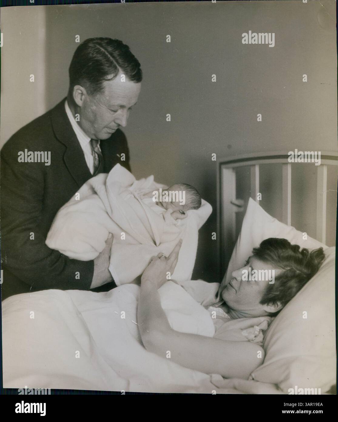 Mayor and Mrs. Leach are photographed with their first child at ...