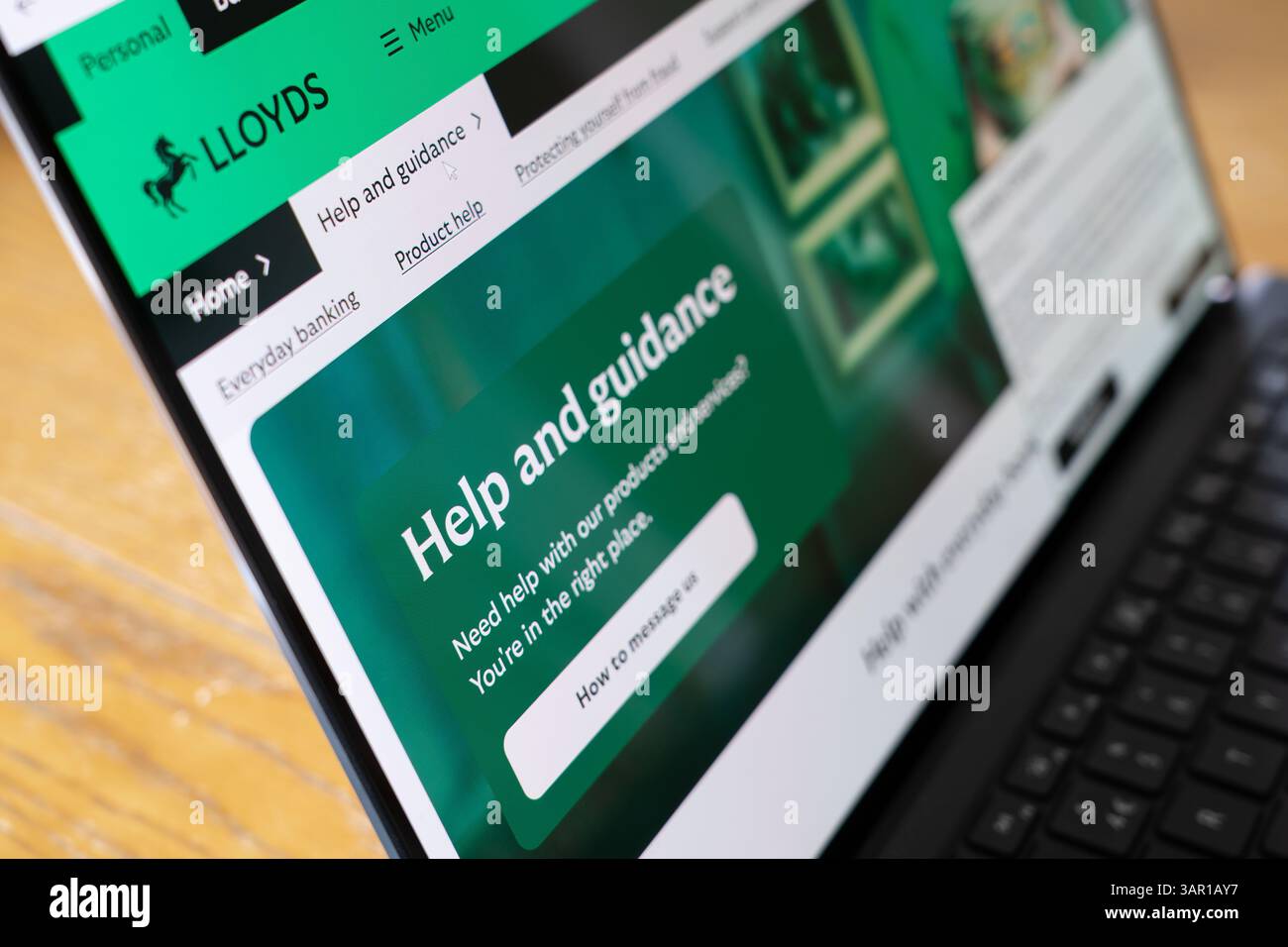 Lloyds bank help and support page on website on laptop screen. Concept ...