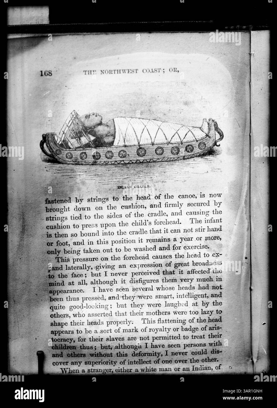 A copy negative depicting an Indian cradle, showcasing traditional ...