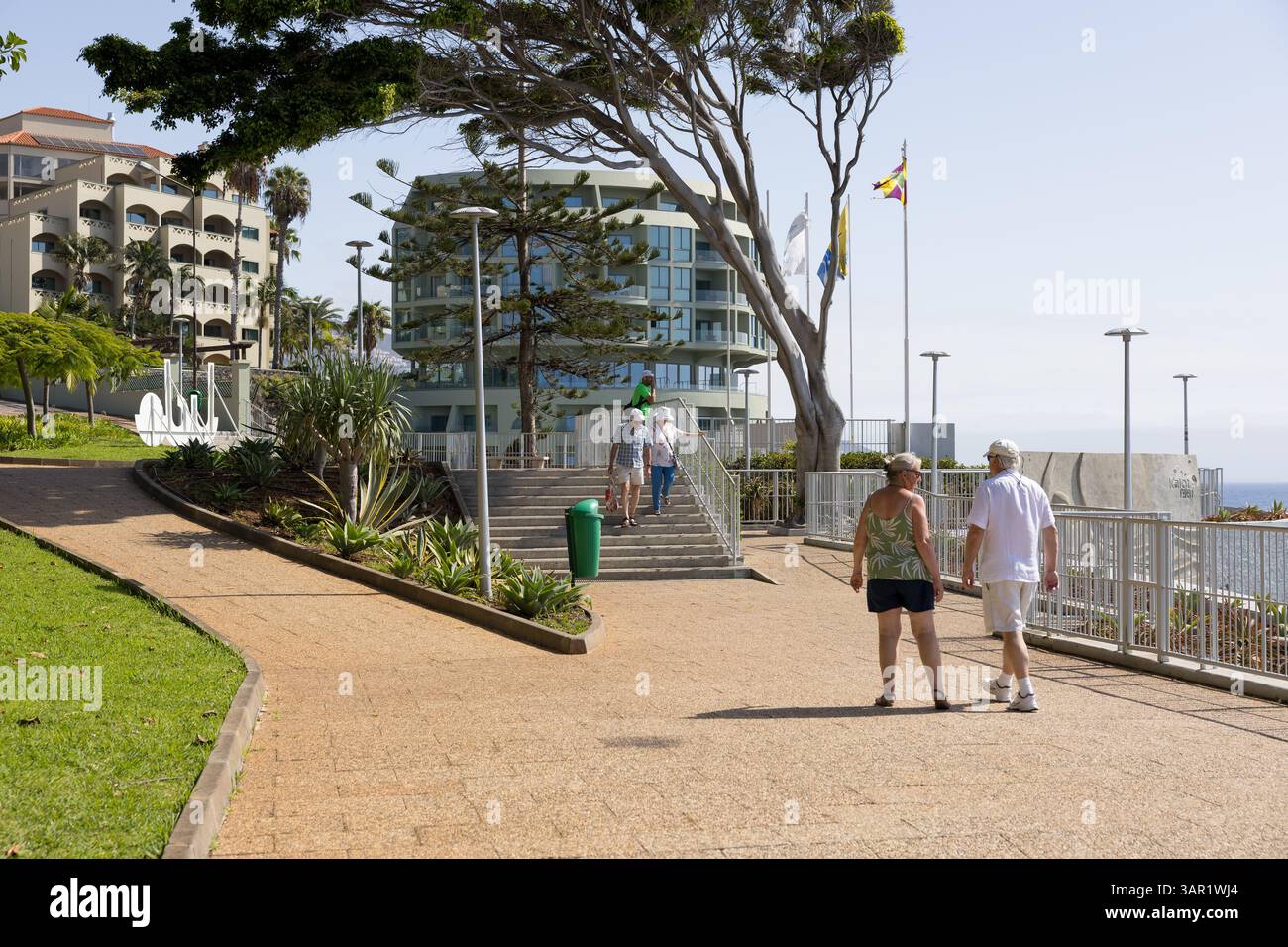 Funchal, Portugal - 05.10.2024: Senior tourists taking a walk in the ...