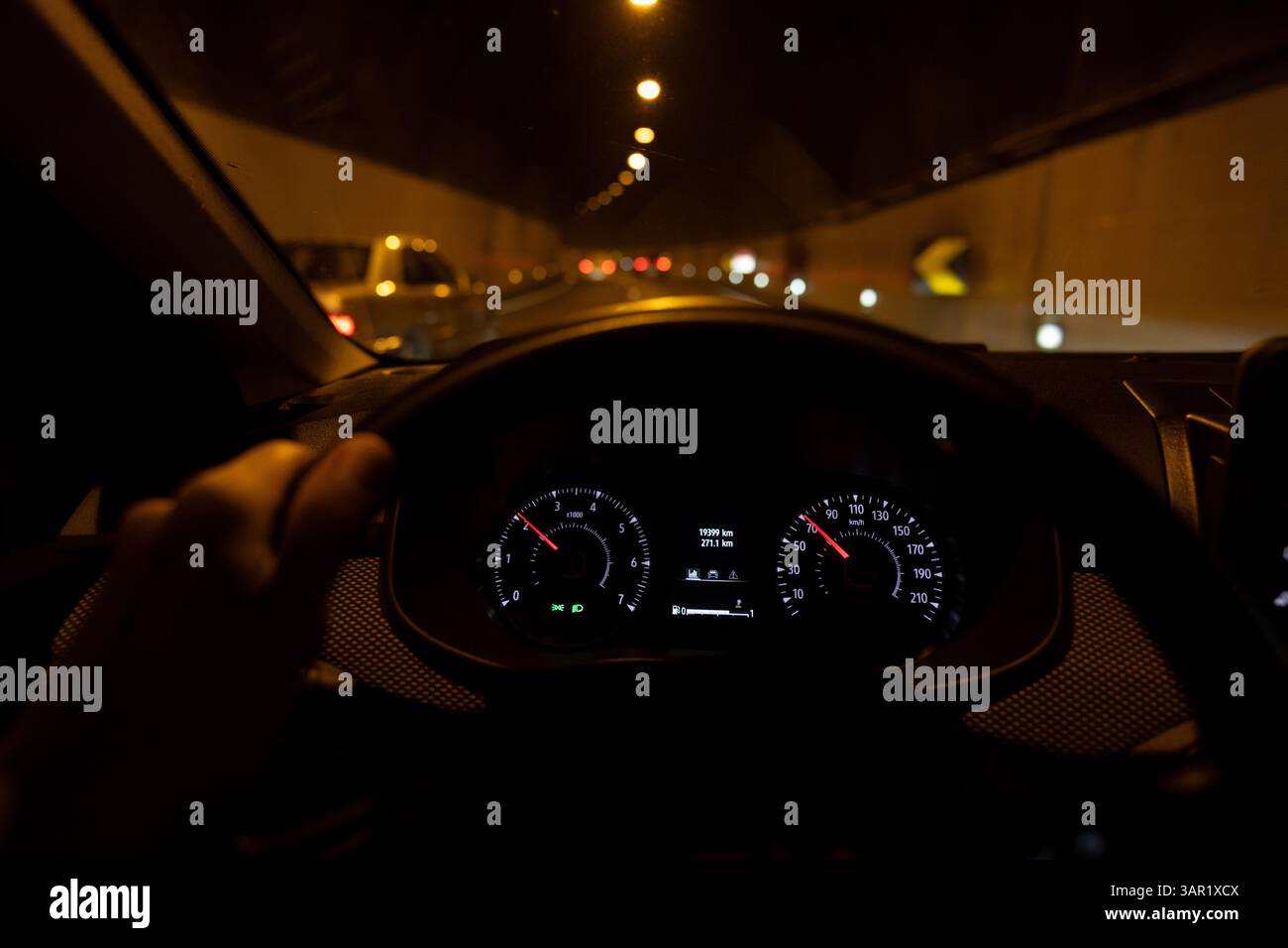 View from the inside of a car driving on a tunnel road. Driver POV to ...