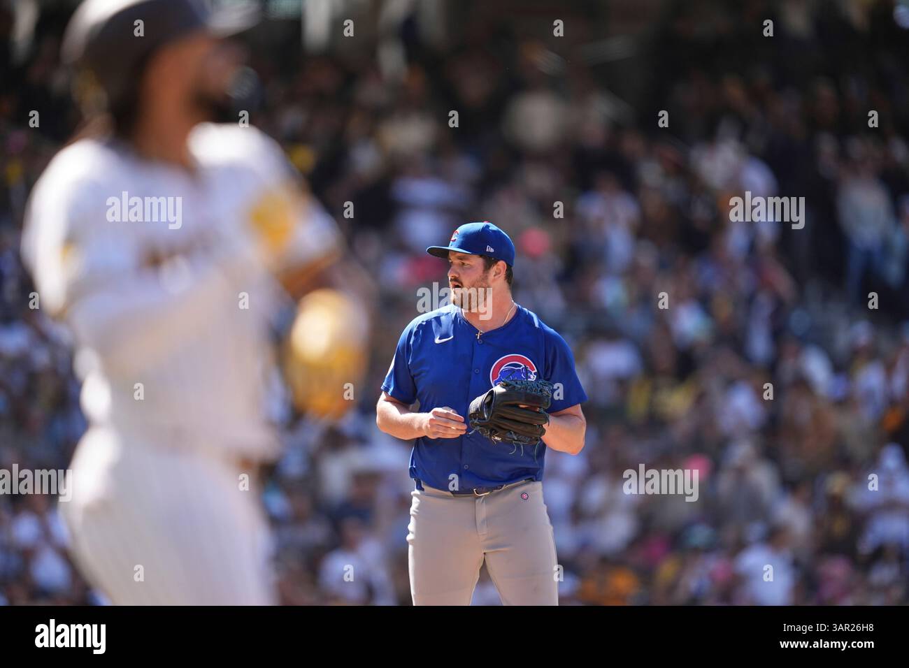 Chicago Cubs relief pitcher Luke Little looks on after walking San ...