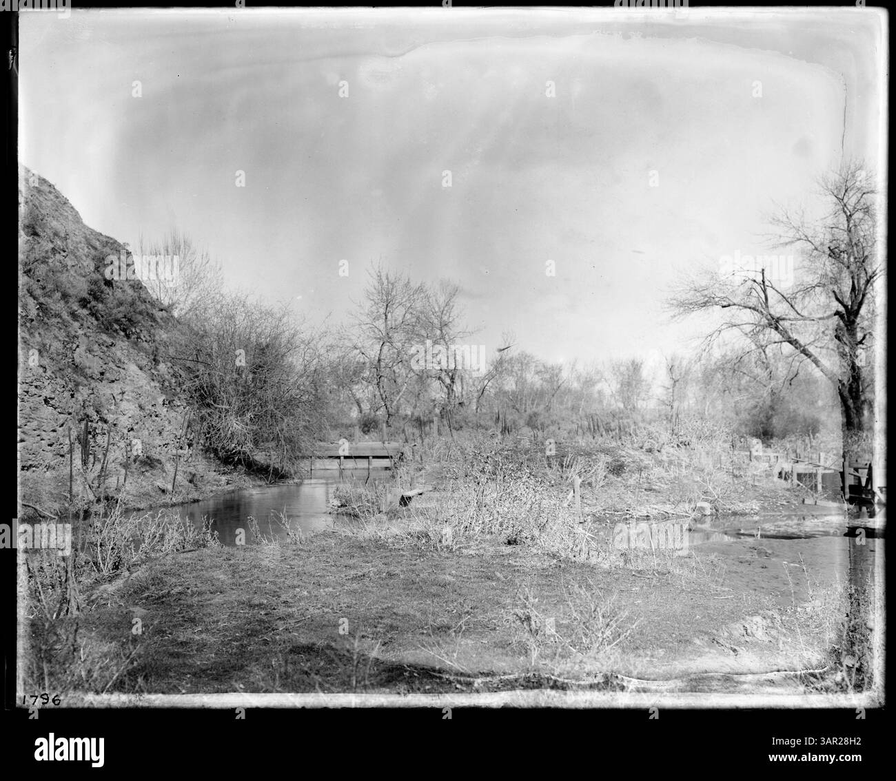 This photograph, taken by Lee Moorhouse, shows an irrigation canal and ...