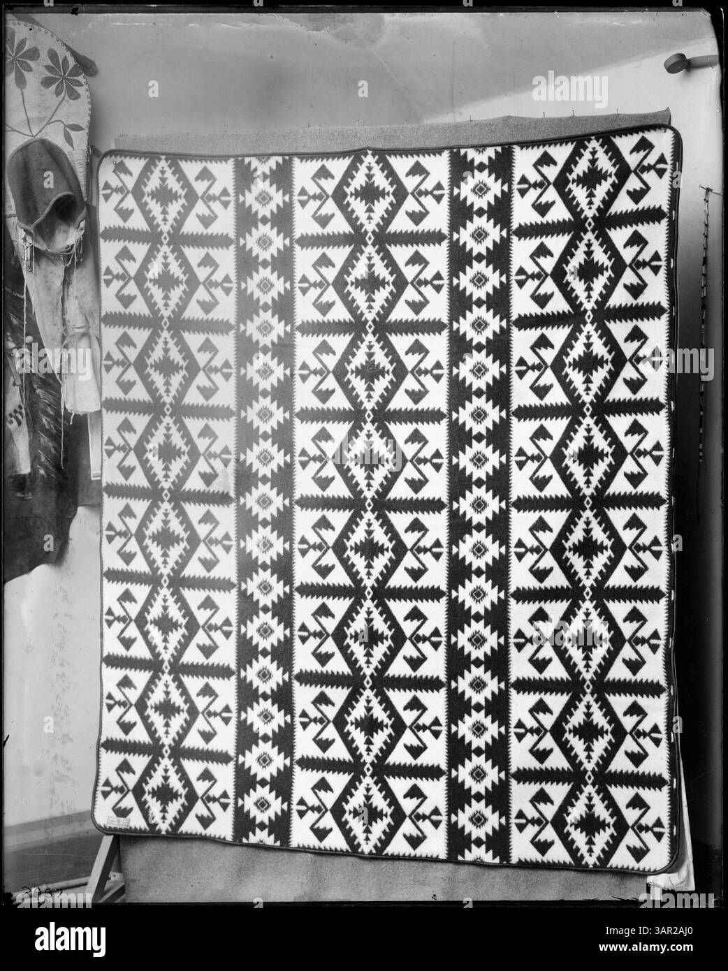 The photograph showcases a display of blankets from Pendleton Woolen ...