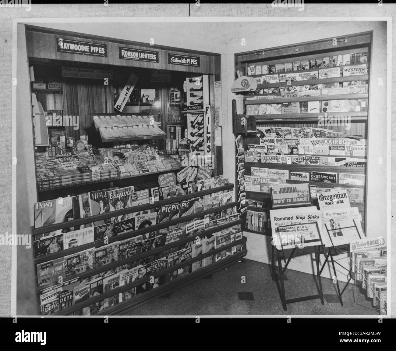 Photograph showing the interior of a store, with shelves stocked with ...