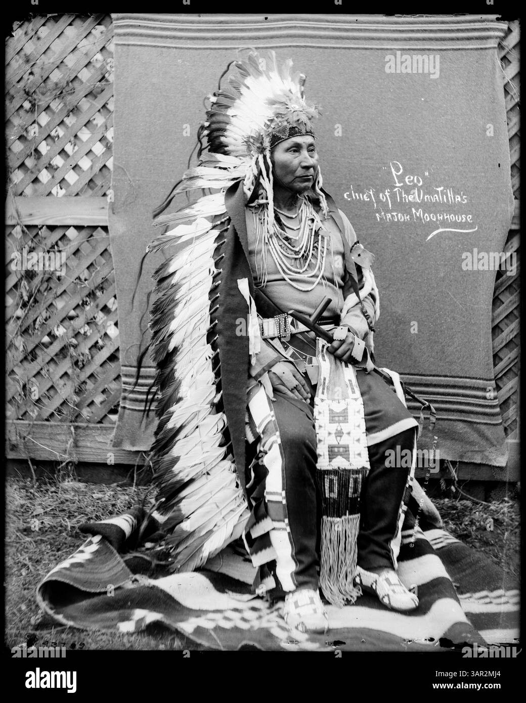 Photograph of Peo, Chief of the Umatillas, wearing a war bonnet with ...