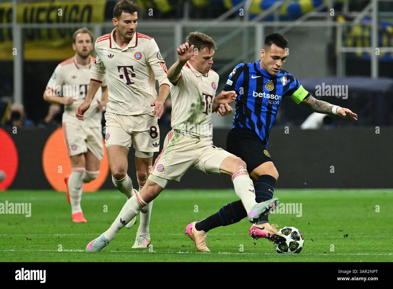 Milan, Italy. 17th Apr, 2025. Joshua Kimmich of F.C. Bayern Munchen and Lautaro Martinez of F.C ...