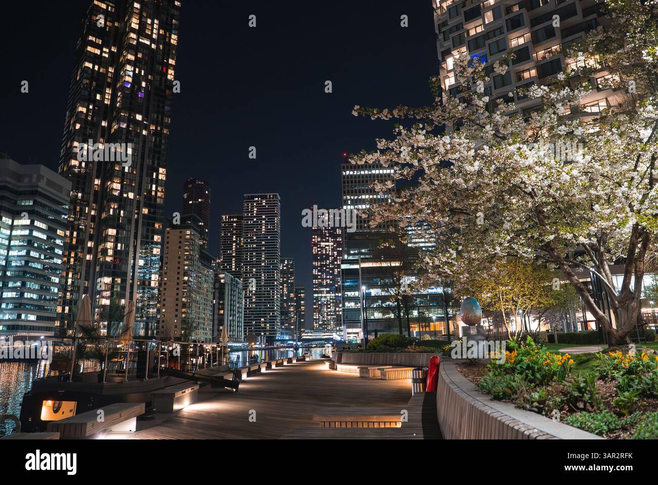 Nighttime View of Canary Wharf with Illuminated Skyscrapers and ...