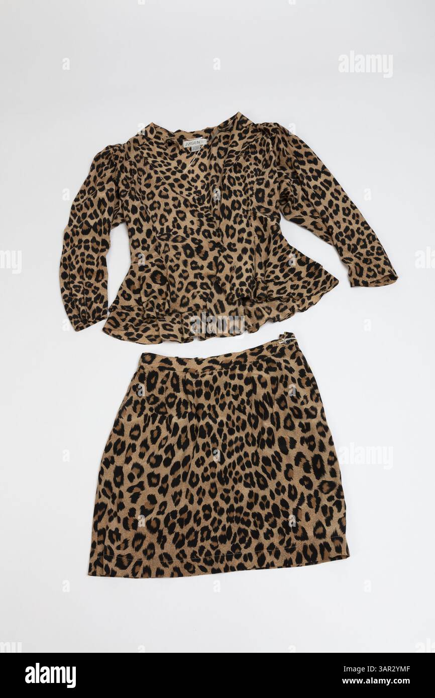 Bonnie Blake, also known as John Chaney, wears a leopard print skirt ...